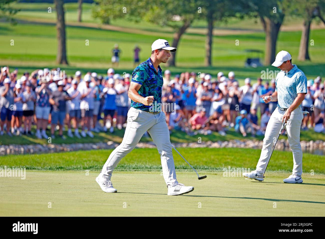 OLYMPIA FIELDS, IL - AUGUST 20: PGA golfer Viktor Hovland reacts to making a birdie putt on the ...