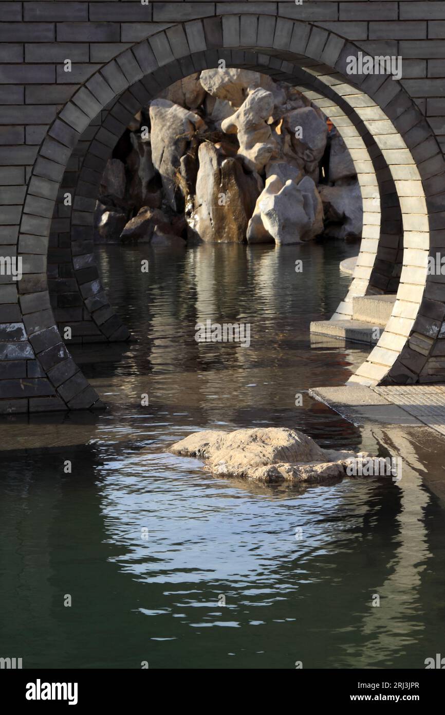 Chinese traditional style landscape architecture -- moon gate in park ...
