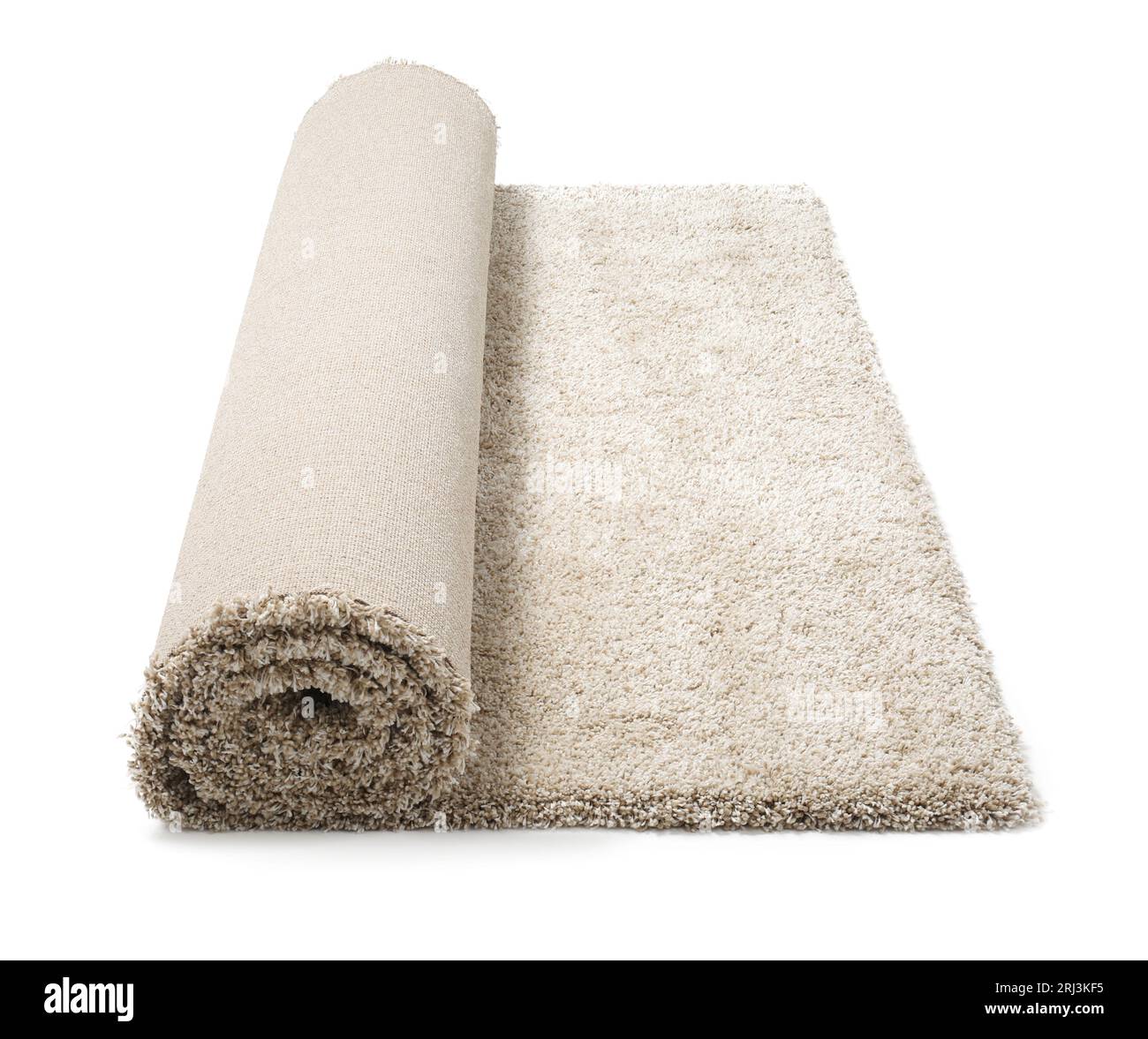 Rolled fuzzy carpet on white background. Interior element Stock Photo ...