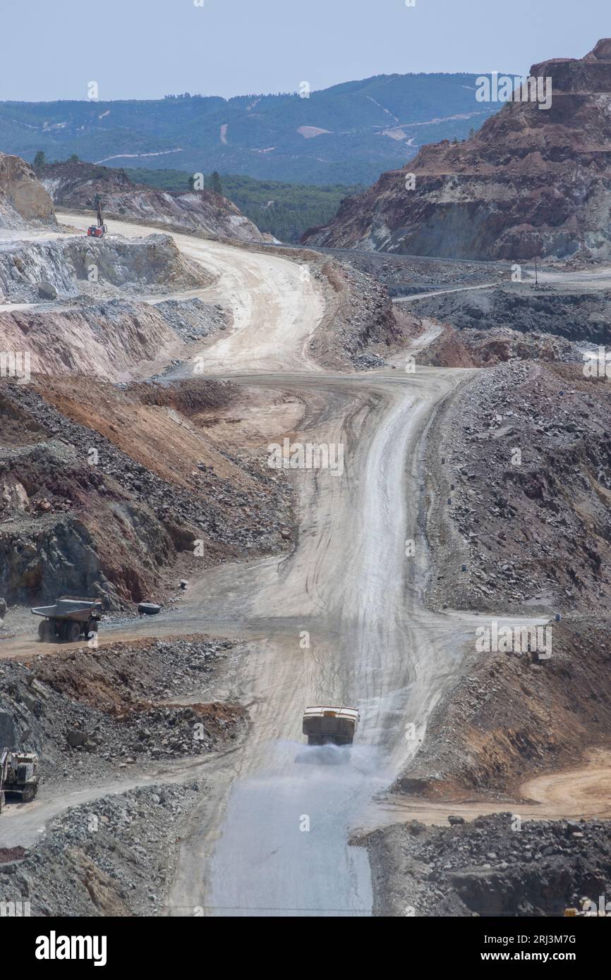 A vertical of a off-road vehicles driving on a dirt road during an open ...