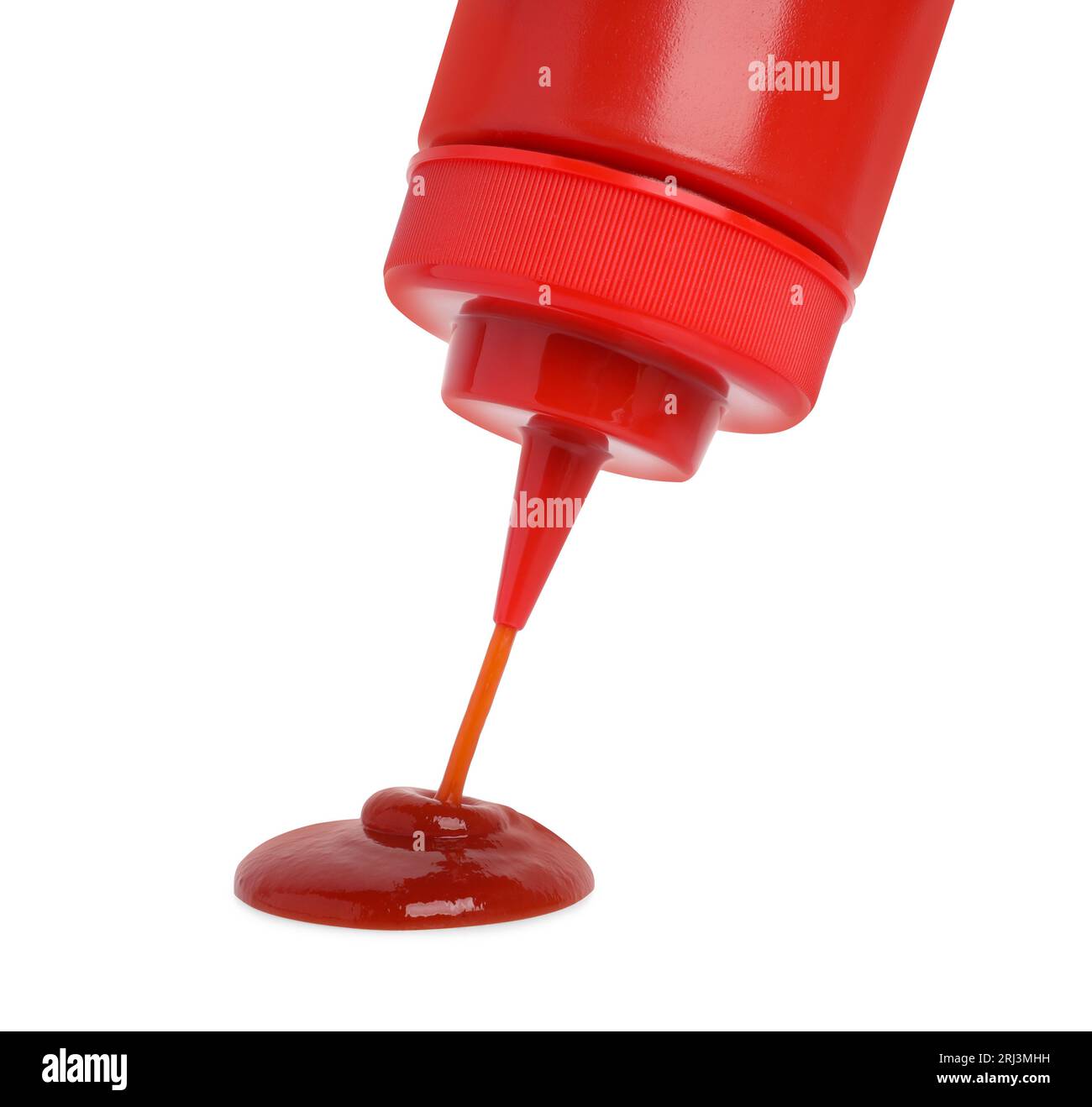 Pouring tasty red ketchup from bottle isolated on white Stock Photo - Alamy