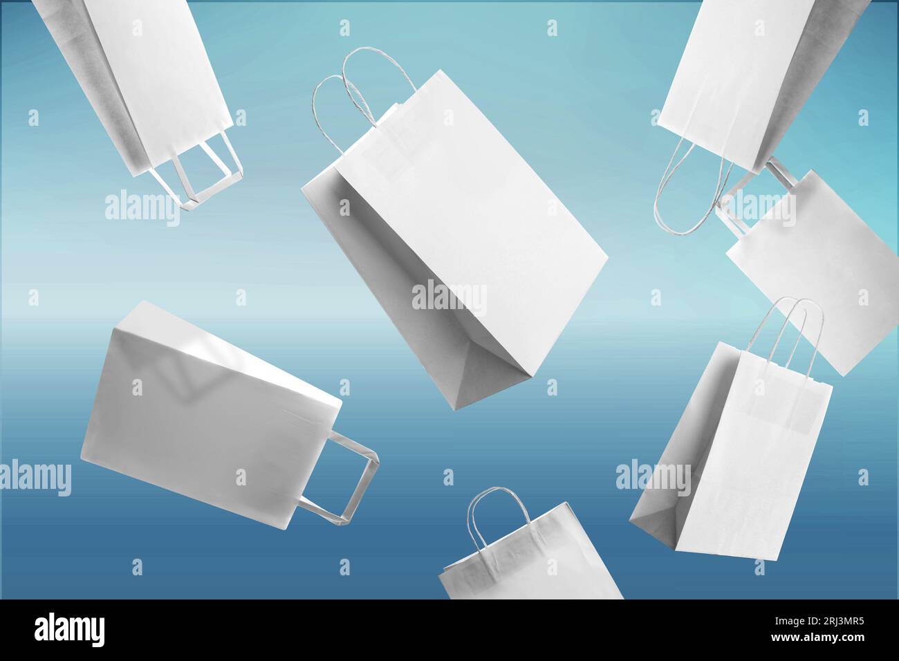 Flying paper shopping bags hi-res stock photography and images - Alamy