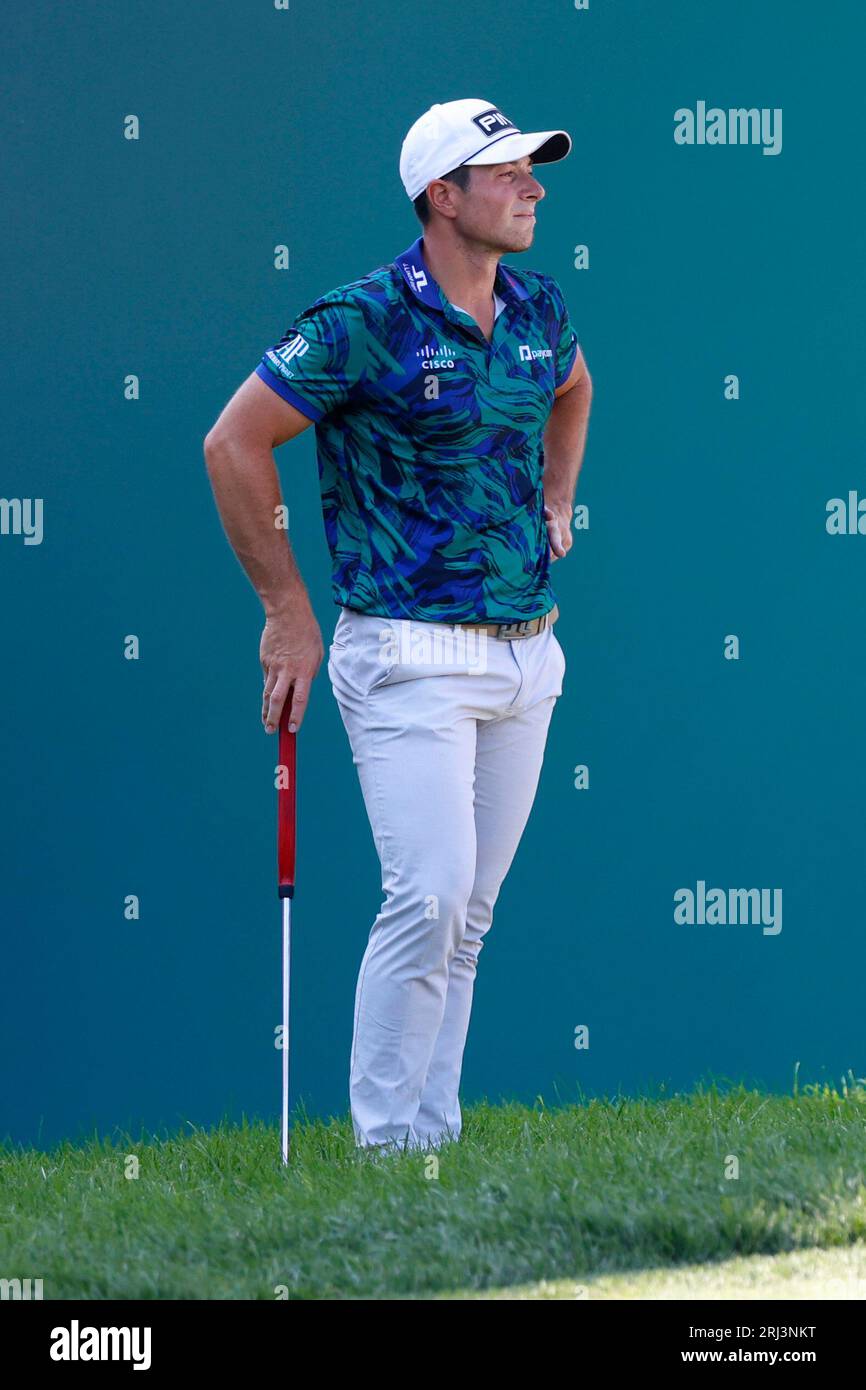 OLYMPIA FIELDS, IL - AUGUST 20: PGA golfer Viktor Hovland waits to putt on the 18th hole during ...