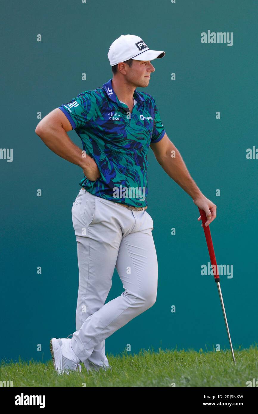 OLYMPIA FIELDS, IL - AUGUST 20: PGA golfer Viktor Hovland waits to putt on the 18th hole during ...