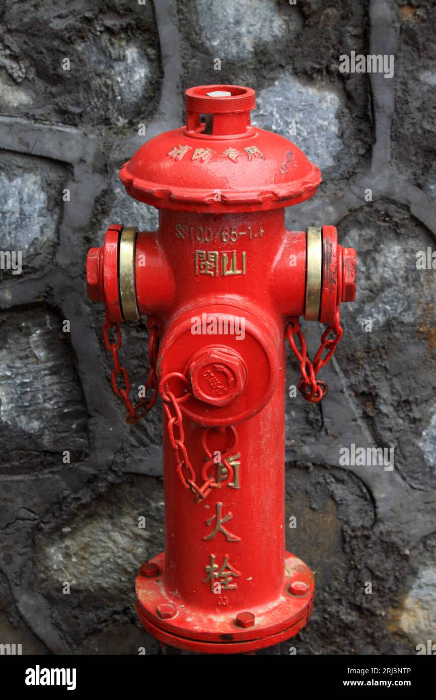 closeup of red fire hydrant in the street, north china Stock Photo - Alamy