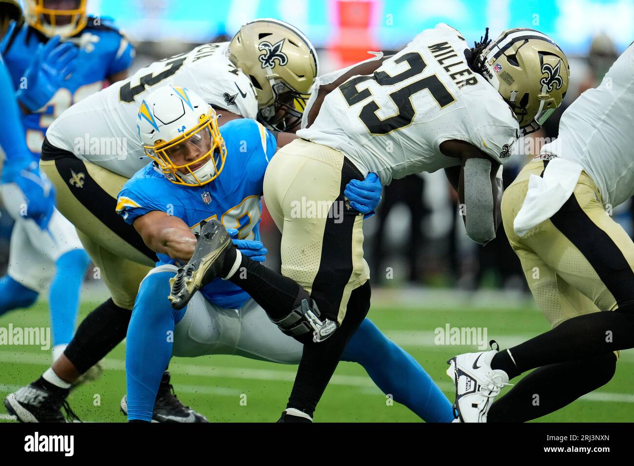 Los Angeles Chargers linebacker Blake Lynch (53) tackles New Orleans ...