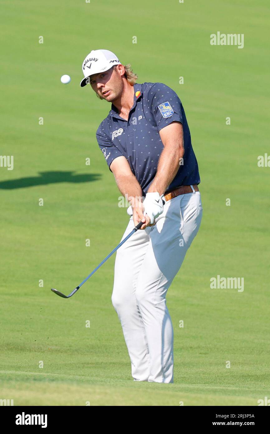 OLYMPIA FIELDS, IL - AUGUST 20: PGA golfer Sam Burns hits a wedge shot on the 18th hole during ...