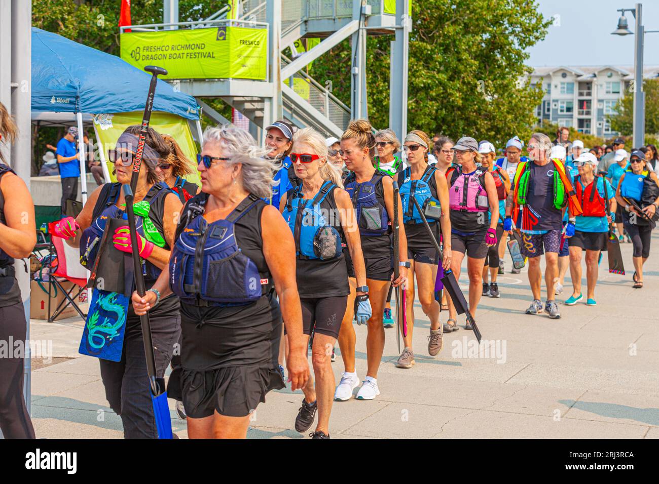 Dragon Boat team heading to their boat at the Richmond Festival in ...