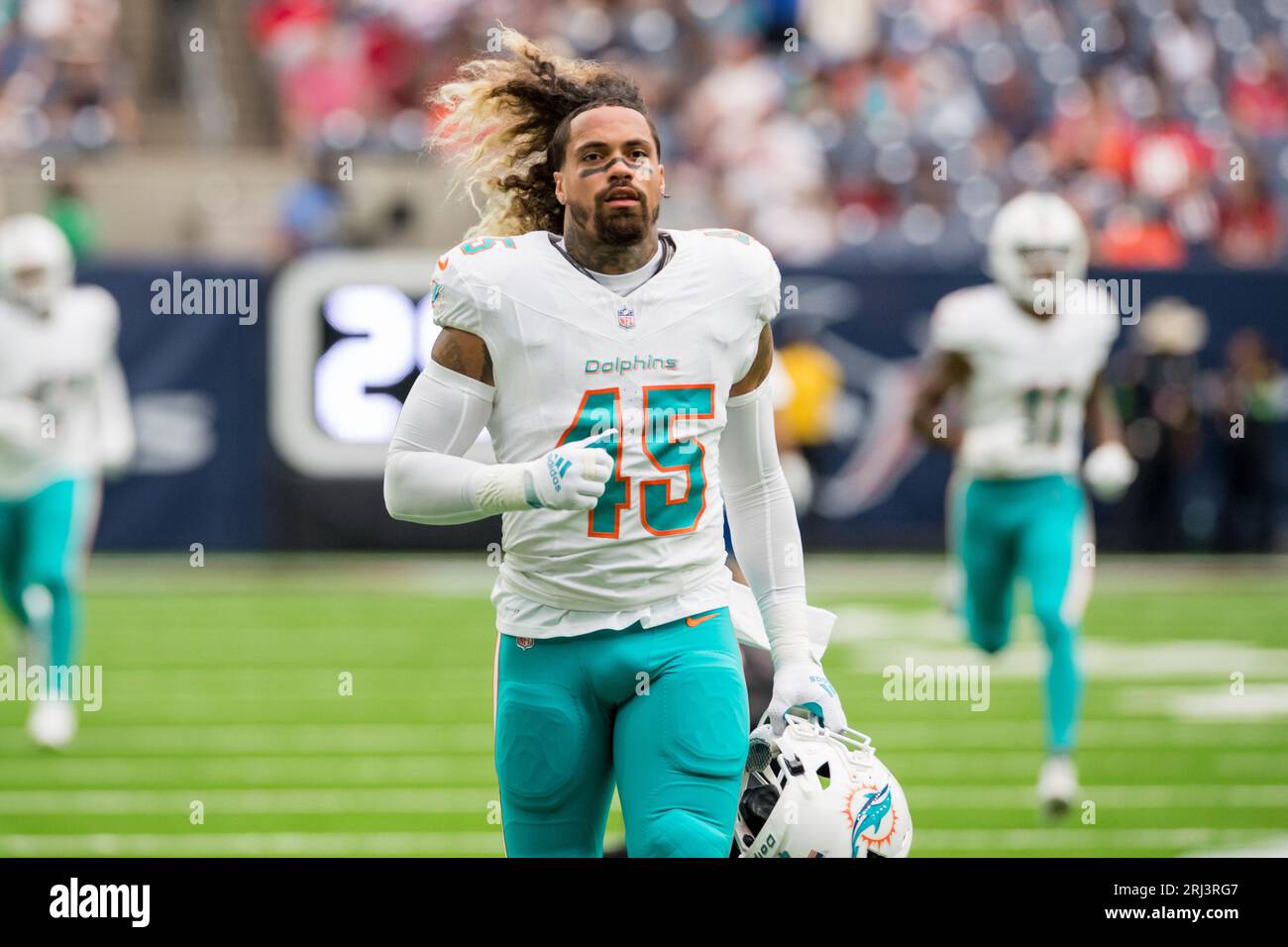 August 19, 2023: Miami Dolphins linebacker Duke Riley (45) runs onto ...
