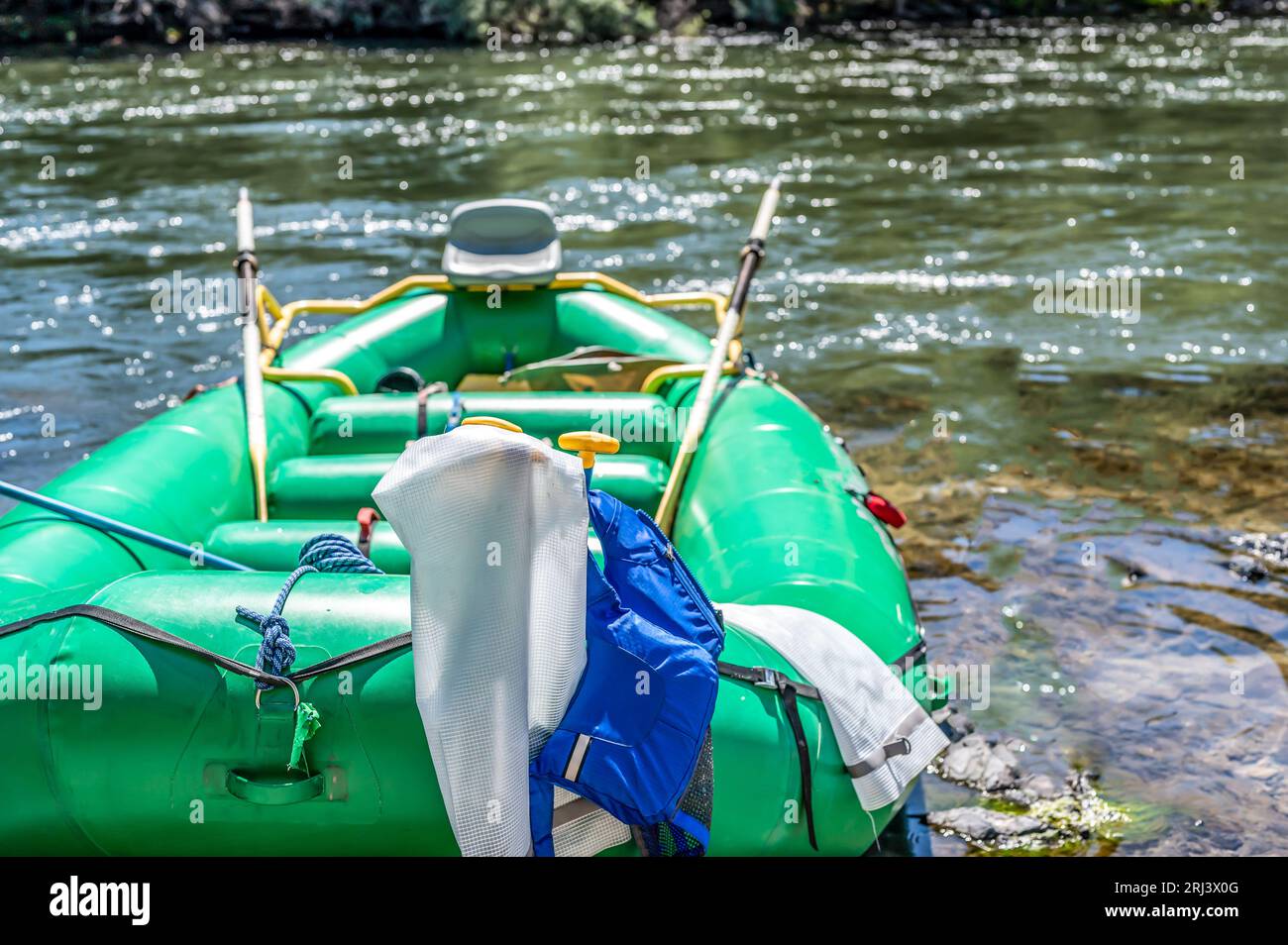 Whitewater inflatable raft sitting in the water ready to start a trip ...