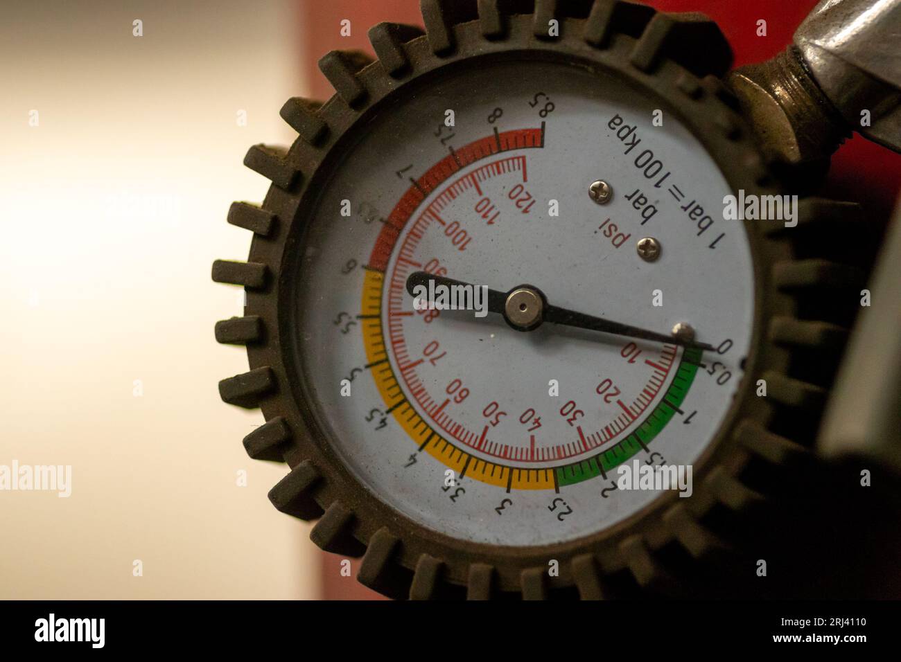 A closeup of a manometer in a car garage with a blurry background Stock ...