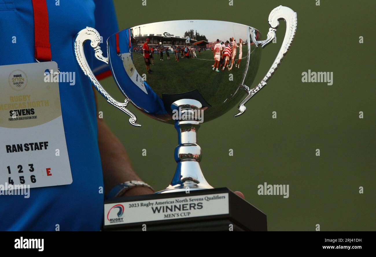 United States players celebrating their gold medal win are reflected in ...