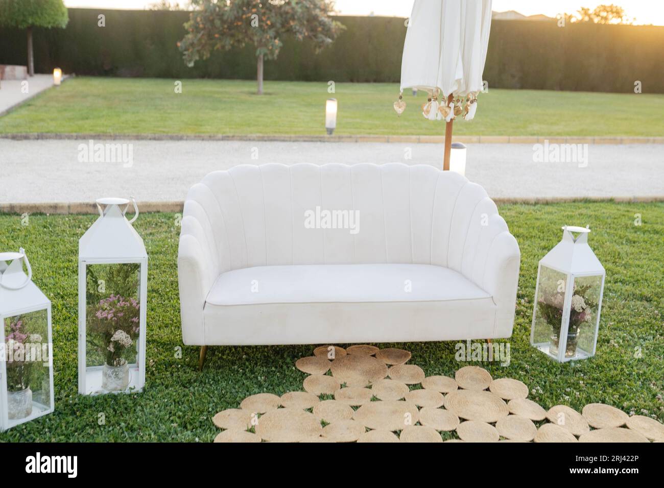 This image captures a stunning outdoor wedding ceremony set up in a ...