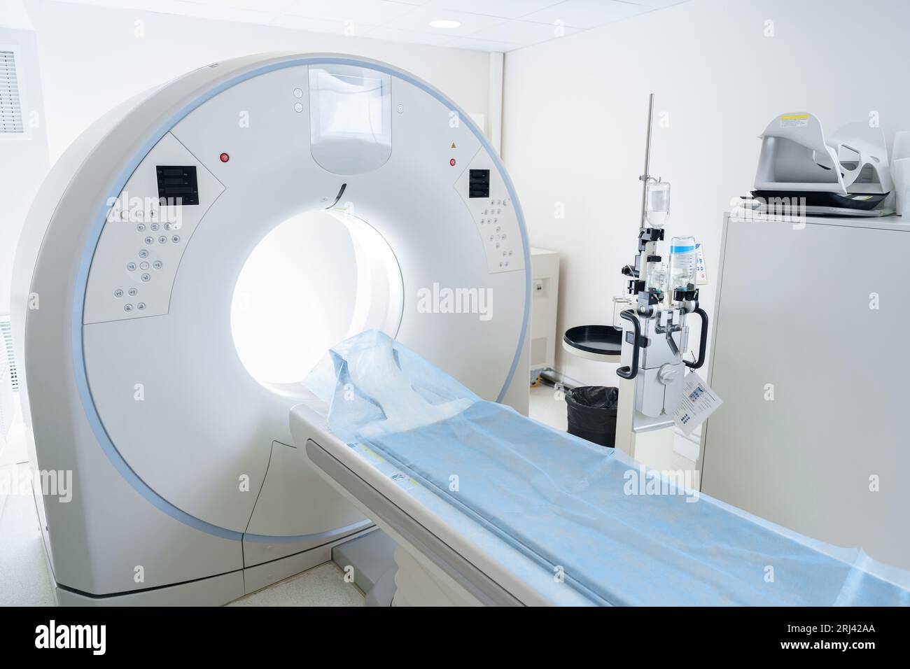 Interior of empty CT scan room in modern medical center is ready for ...