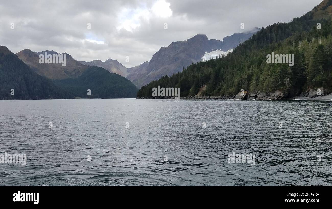 An aerial view of a body of water set in a lush green landscape Stock ...