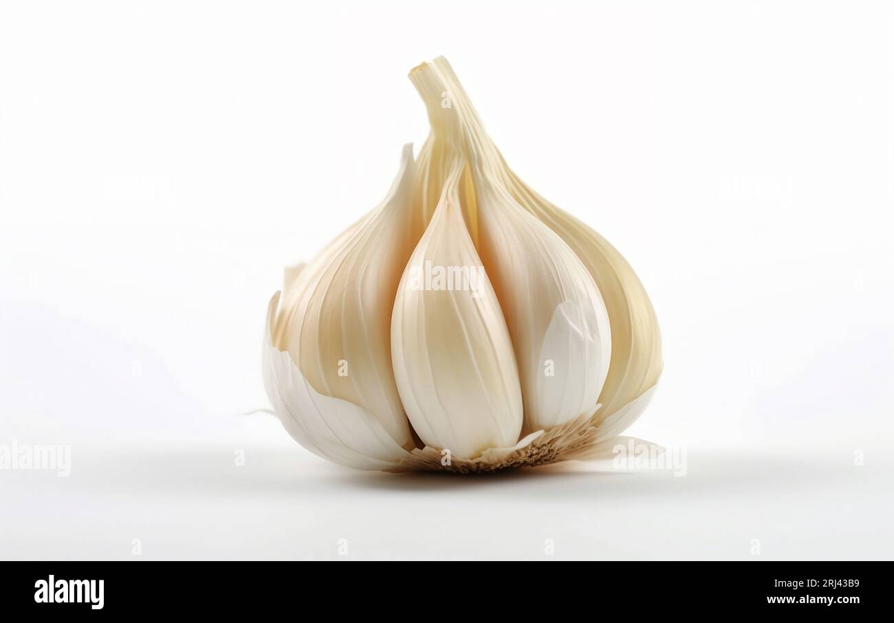 A close-up shot of a single clove of garlic, isolated on a white ...