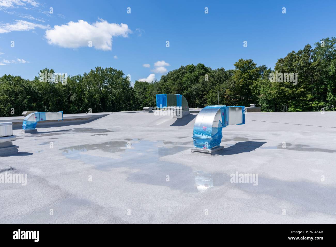 Construction of new roof mounted HVAC Ductwork waiting for new Roof Top ...