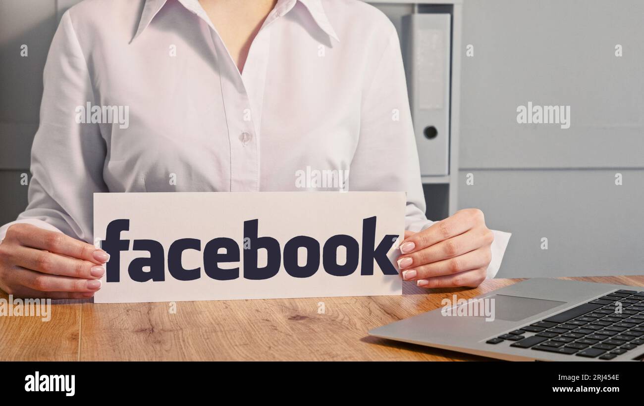Facebook logo social media female hands showing Stock Photo - Alamy