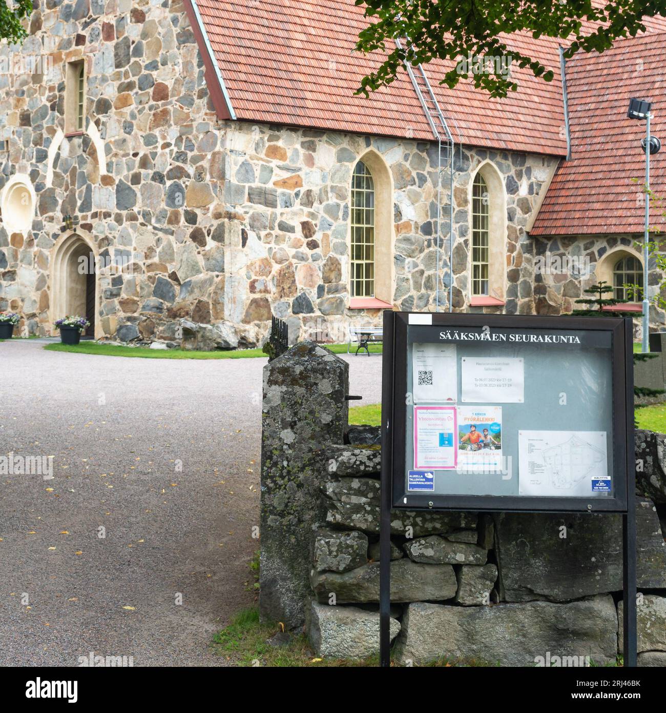 Sääksmäki congregation info board by the old stone church that was ...