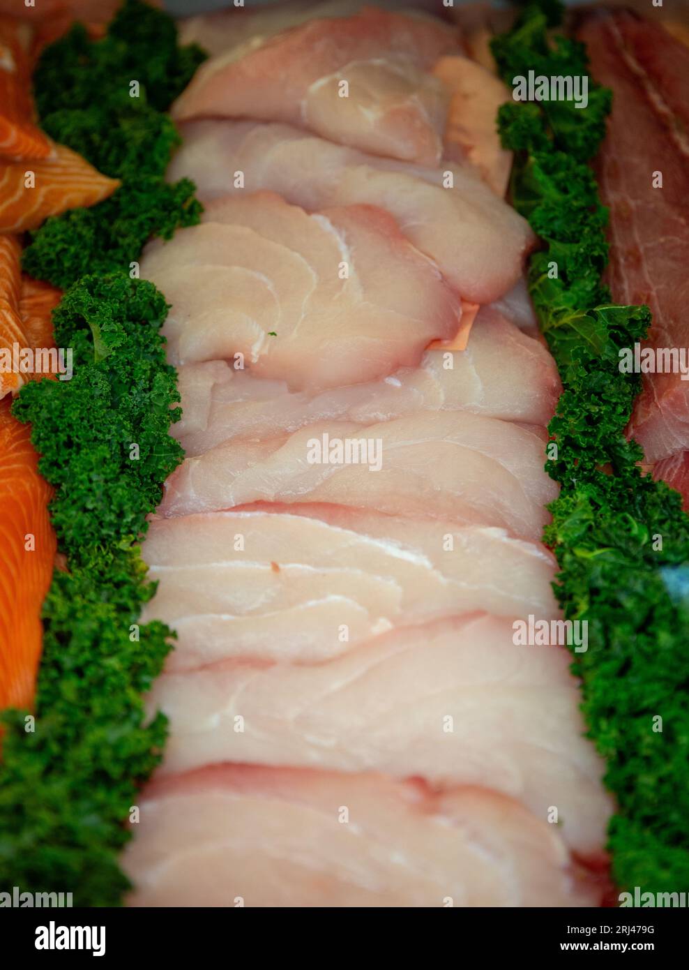 Raw Yellow tail filets at a fish market Stock Photo - Alamy