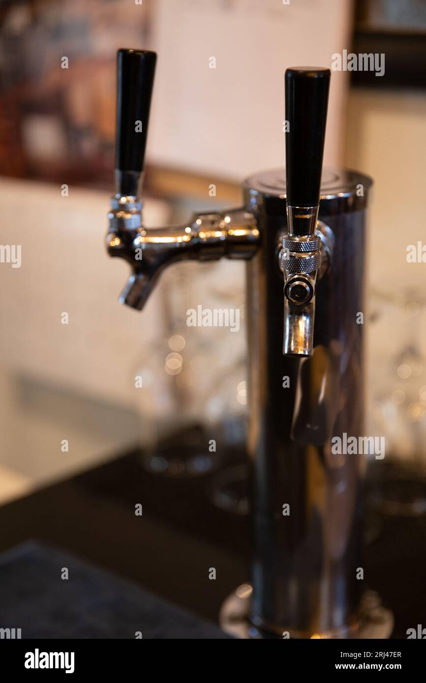 Duo beer tap at a bar unlabeled Stock Photo - Alamy