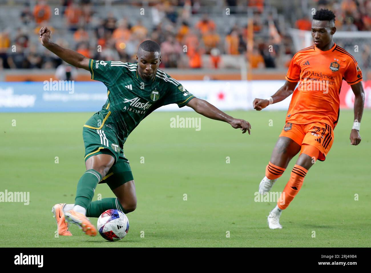 Portland Timbers defender Juan David Mosquera, left, moves the ball in ...