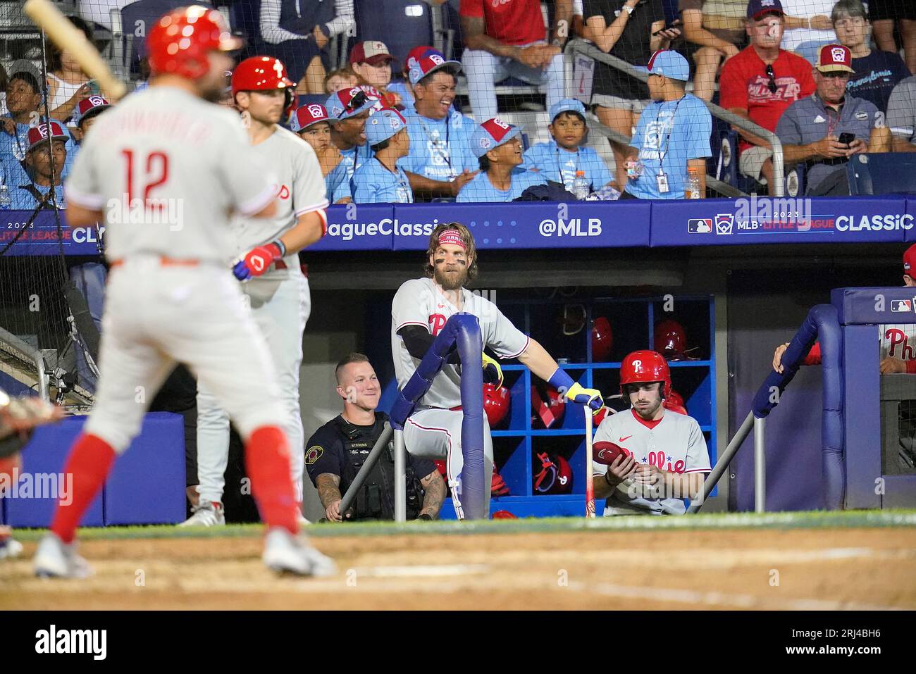 Philadelphia Phillies' Bryce Harper, center, is seen standing on the ...
