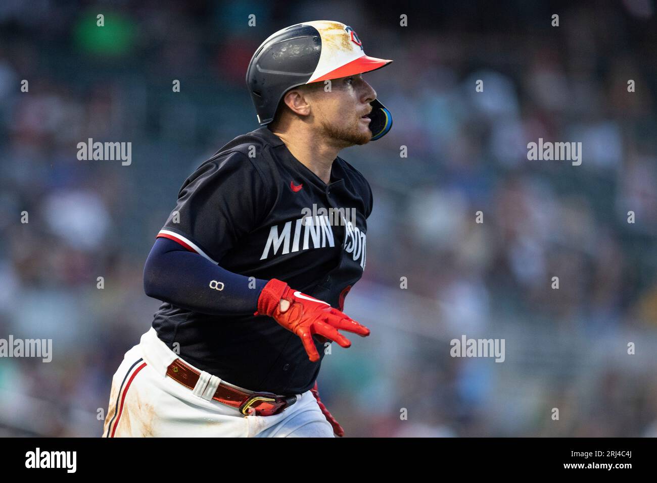 Minnesota Twins' Christian Vazquez runs to first base after getting a ...