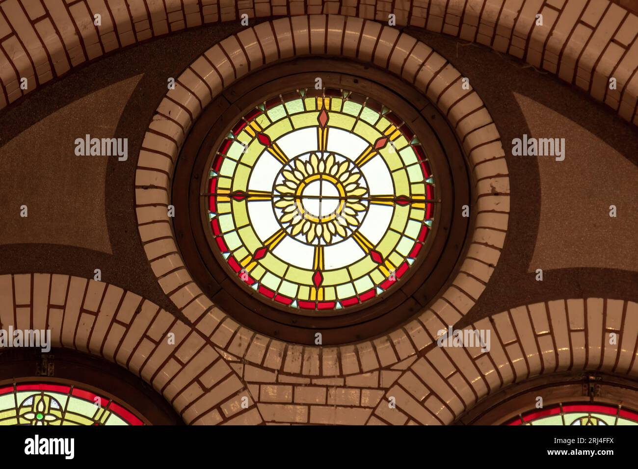 The colorful stained glass window with different colored pieces of ...