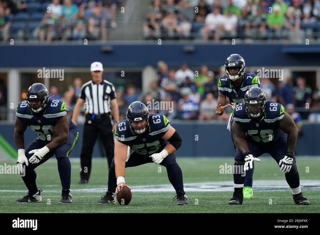 Seattle Seahawks guard Phil Haynes (60), center Evan Brown (63) and ...