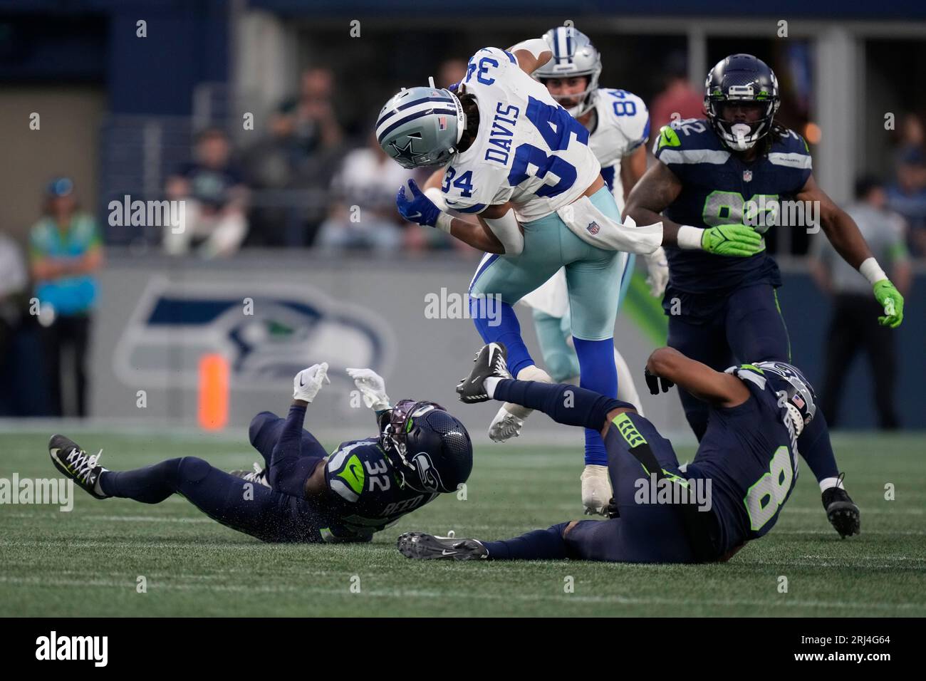 Dallas Cowboys running back Malik Davis (34) breaks a tackle during an ...