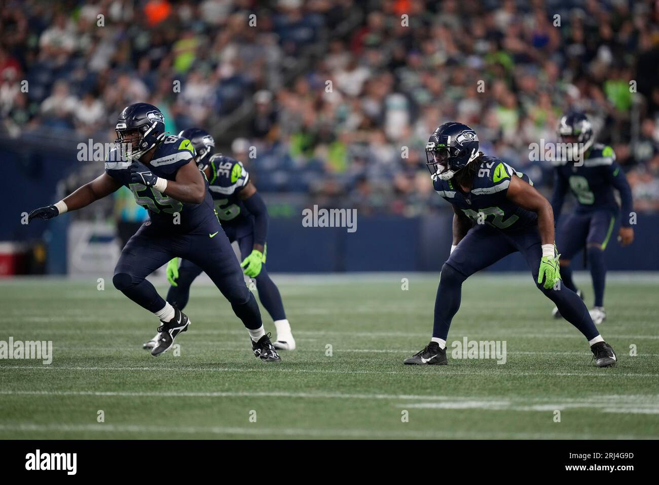 Seattle Seahawks defensive end Jacob Sykes (69) and linebacker Tyreke ...