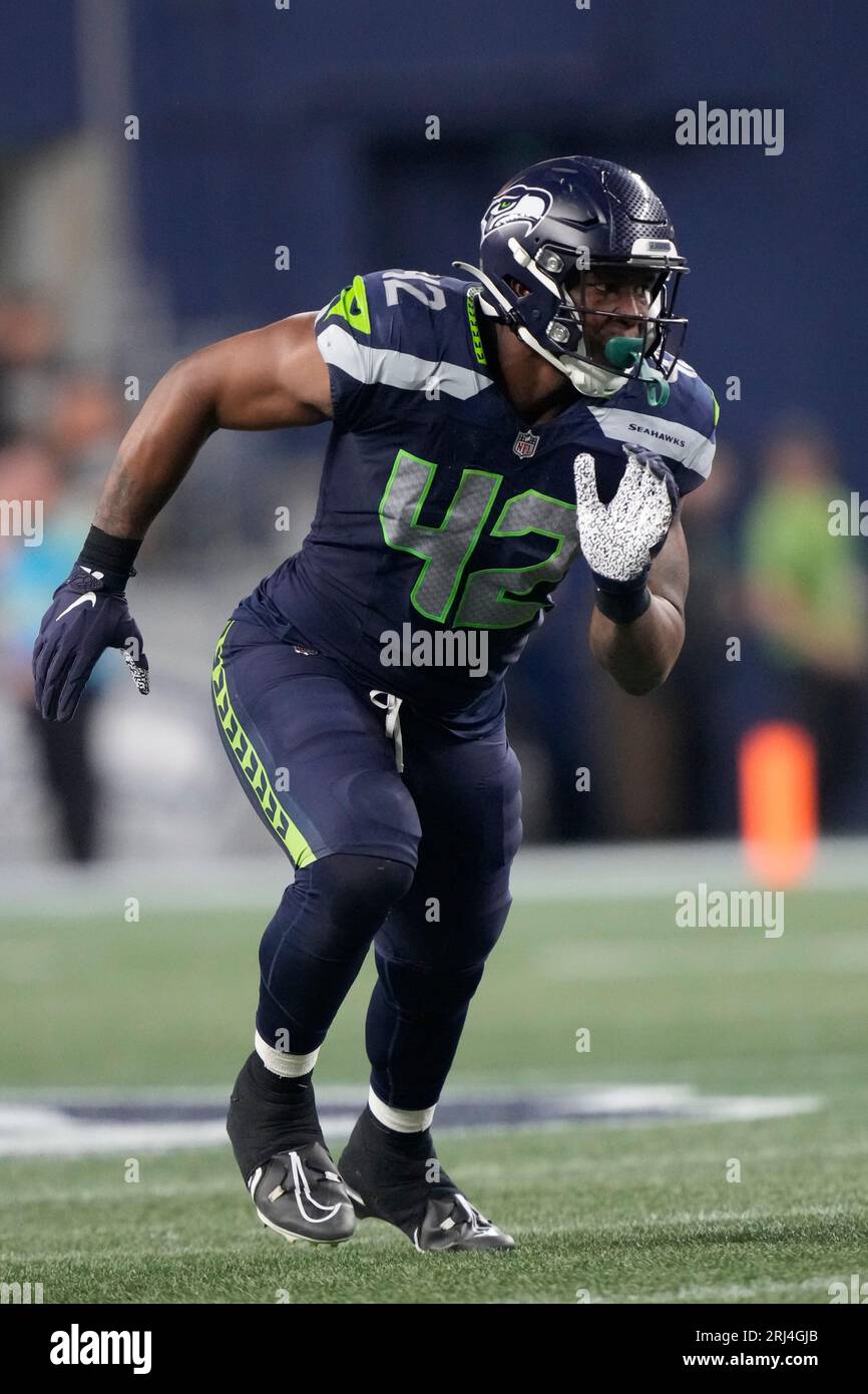 Seattle Seahawks defensive end Jordan Ferguson (42) runs down the field ...