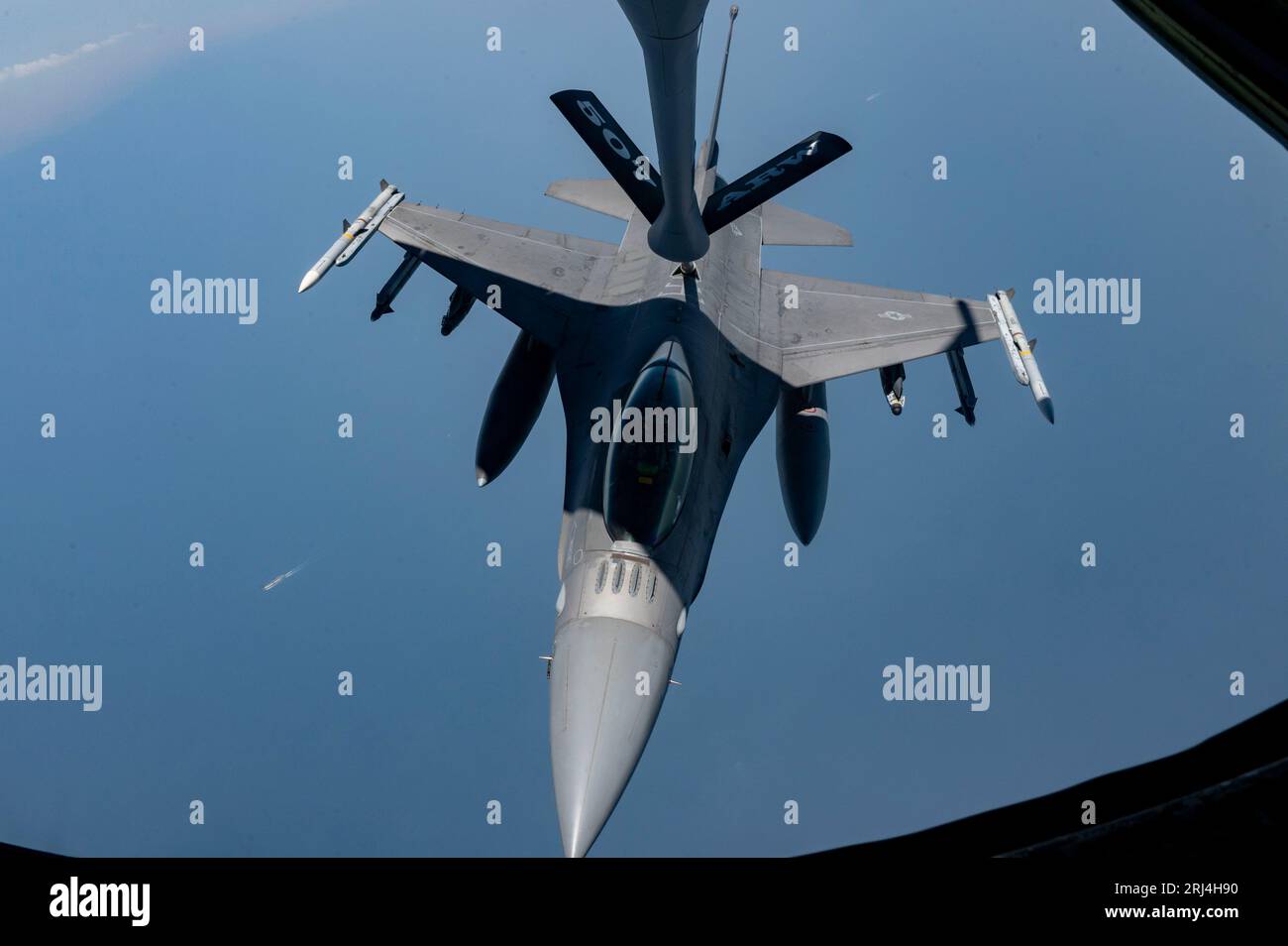 U.S. Air Force F-16 refuels from KC-135 over the Persian Gulf on Aug ...