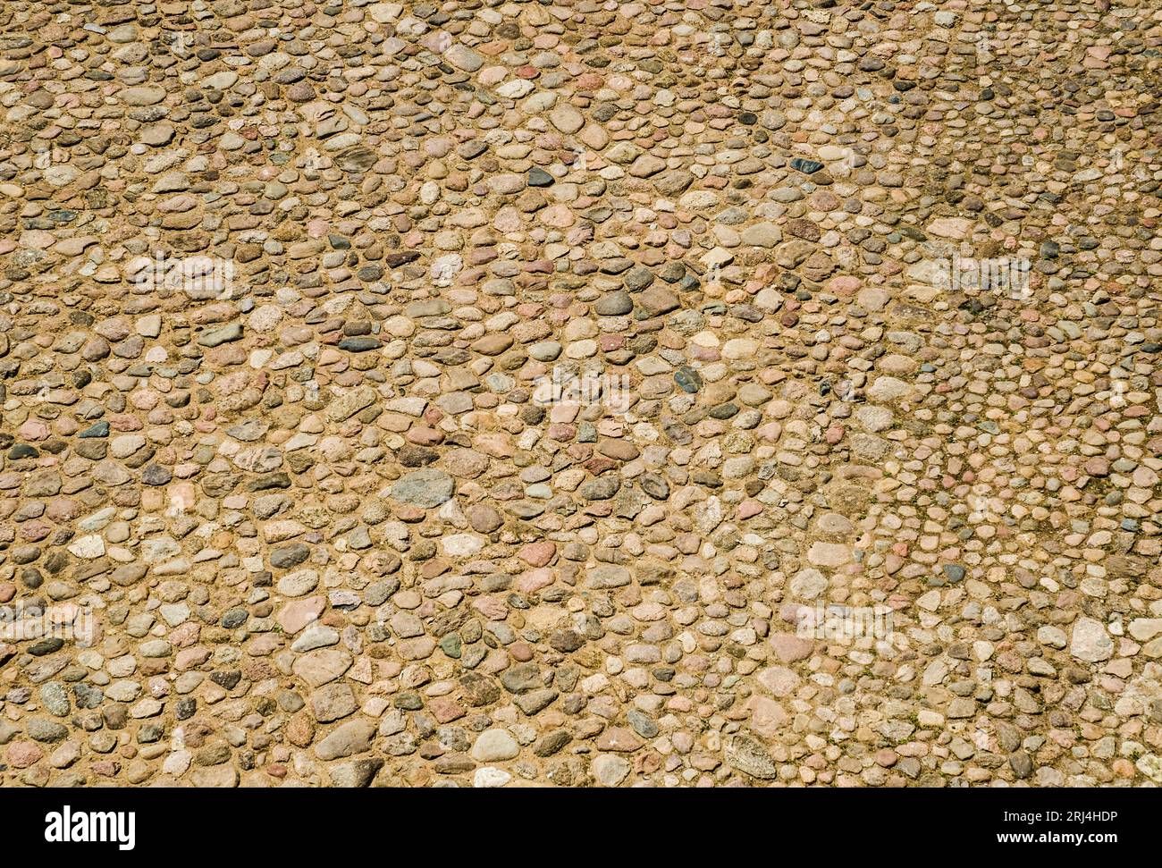 Pattern made of different stones, road pavement texture Stock Photo - Alamy
