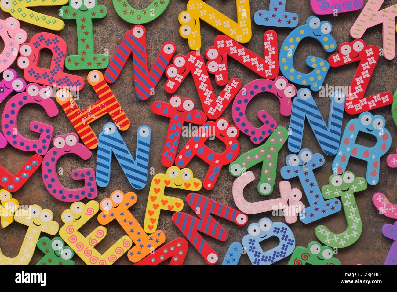 colorful plastic letters on white background, close up Stock Photo - Alamy