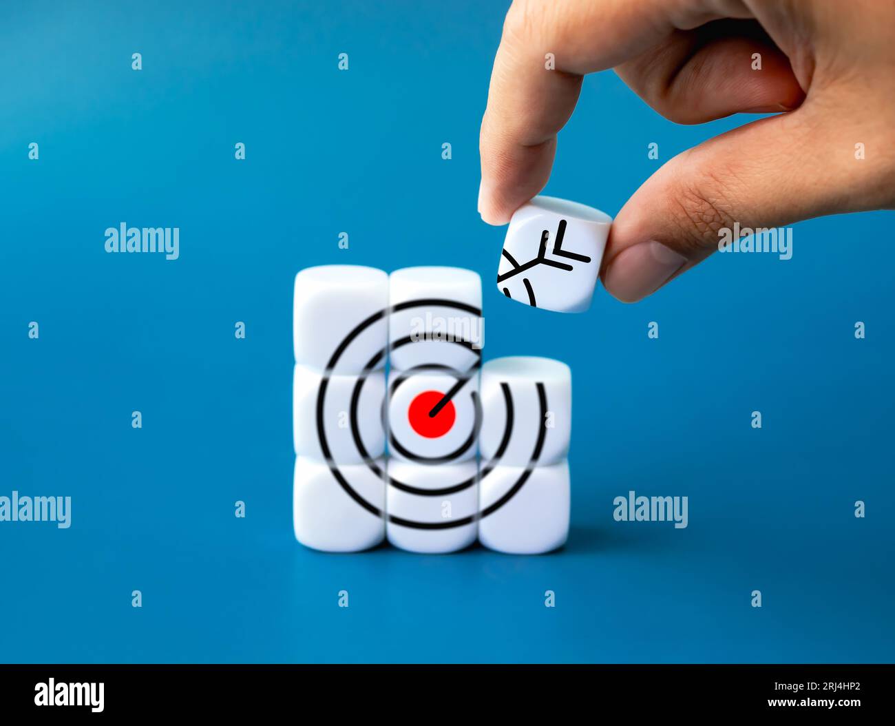 Building success goal business. Last white block holding by hand ...