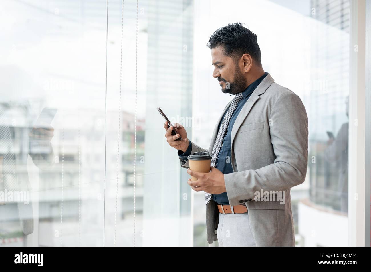 A professional and successful Indian-Asian businessman or male CEO in a ...