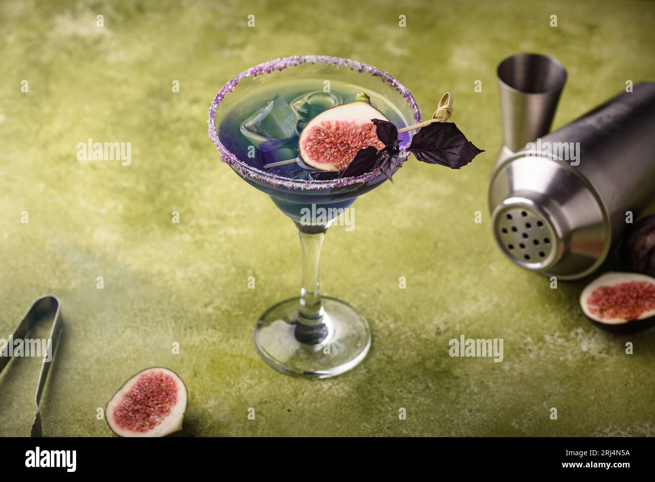 Purple fig cocktail or mocktail in glass Stock Photo - Alamy