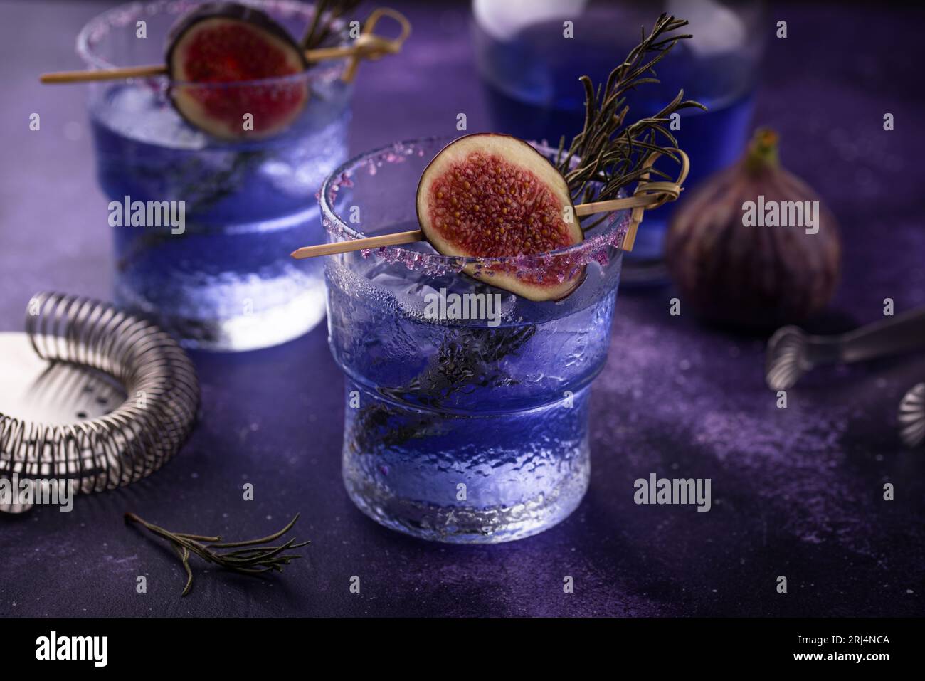 Purple fig cocktail or mocktail in glass Stock Photo - Alamy