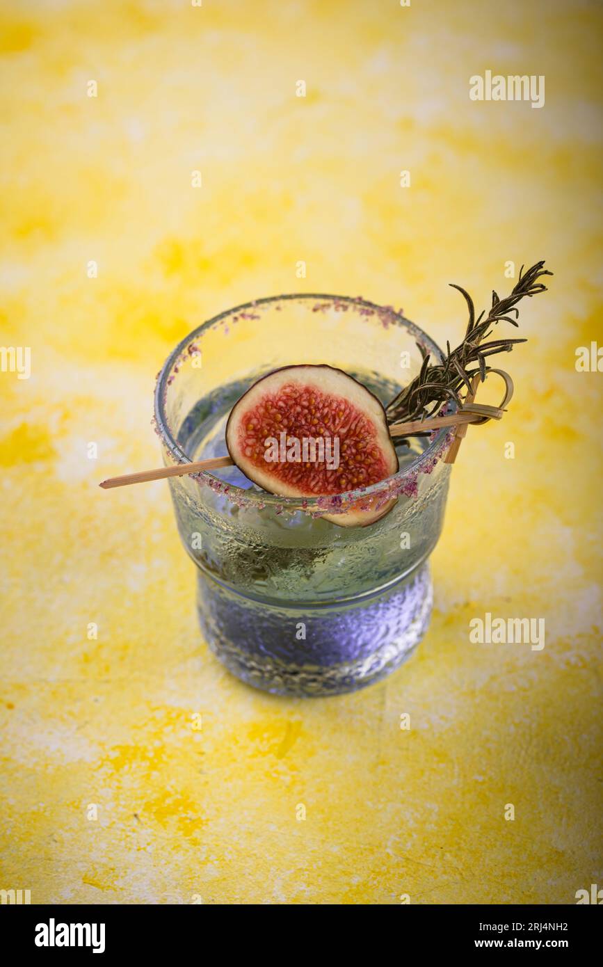 Purple fig cocktail or mocktail in glass Stock Photo - Alamy