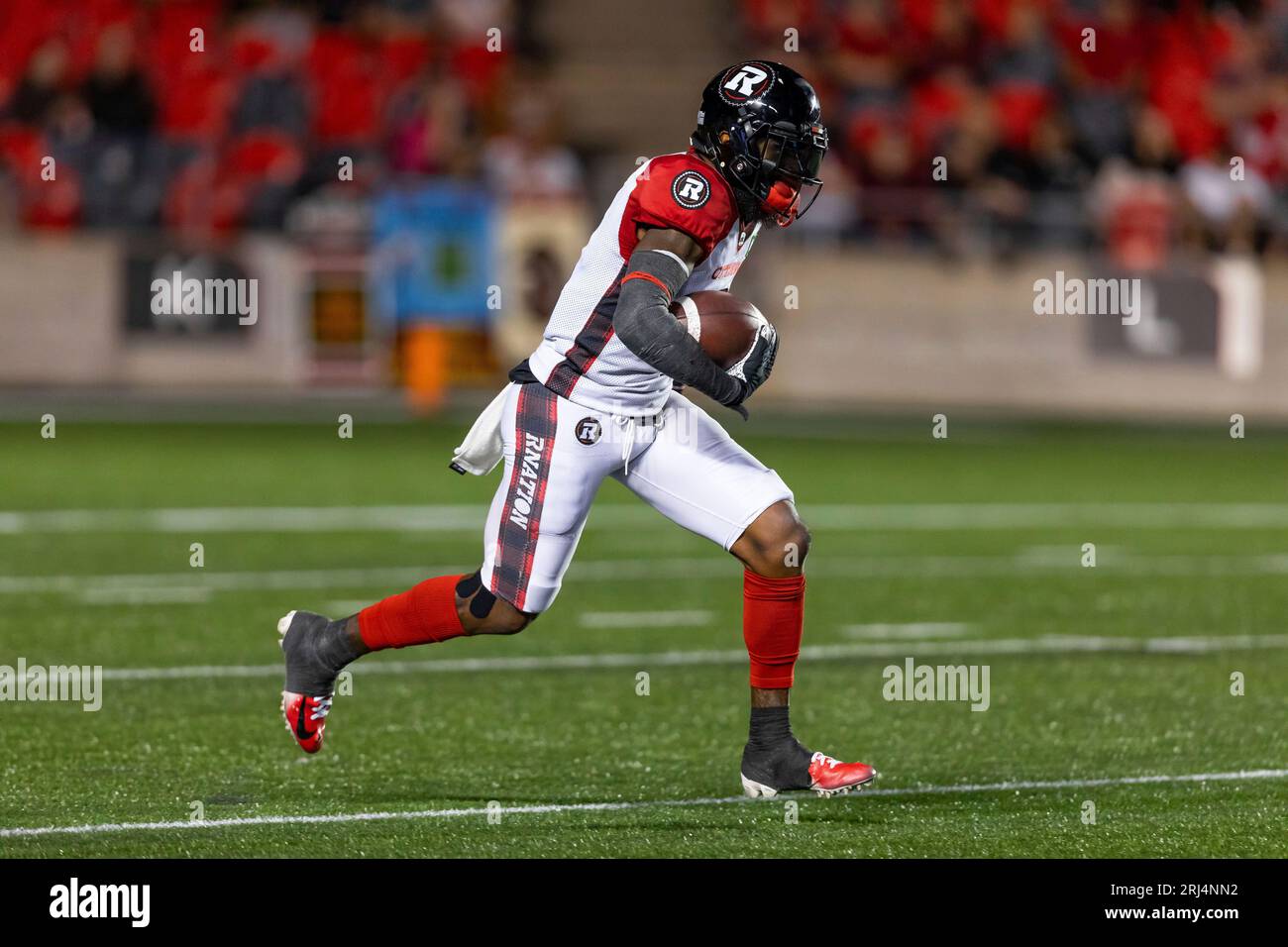 OTTAWA, ON - AUGUST 19: Ottawa Redblacks wide receiver Justin Hardy (2) runs with the ball ...