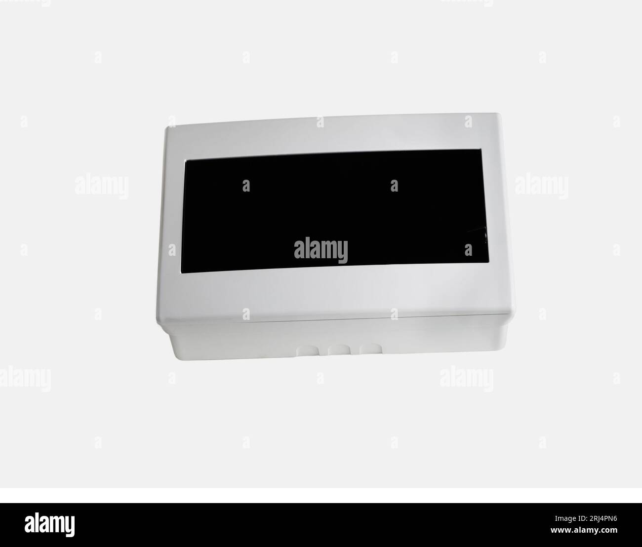 Plastic distribution board. Electrical board. Close-up. Isolated on ...