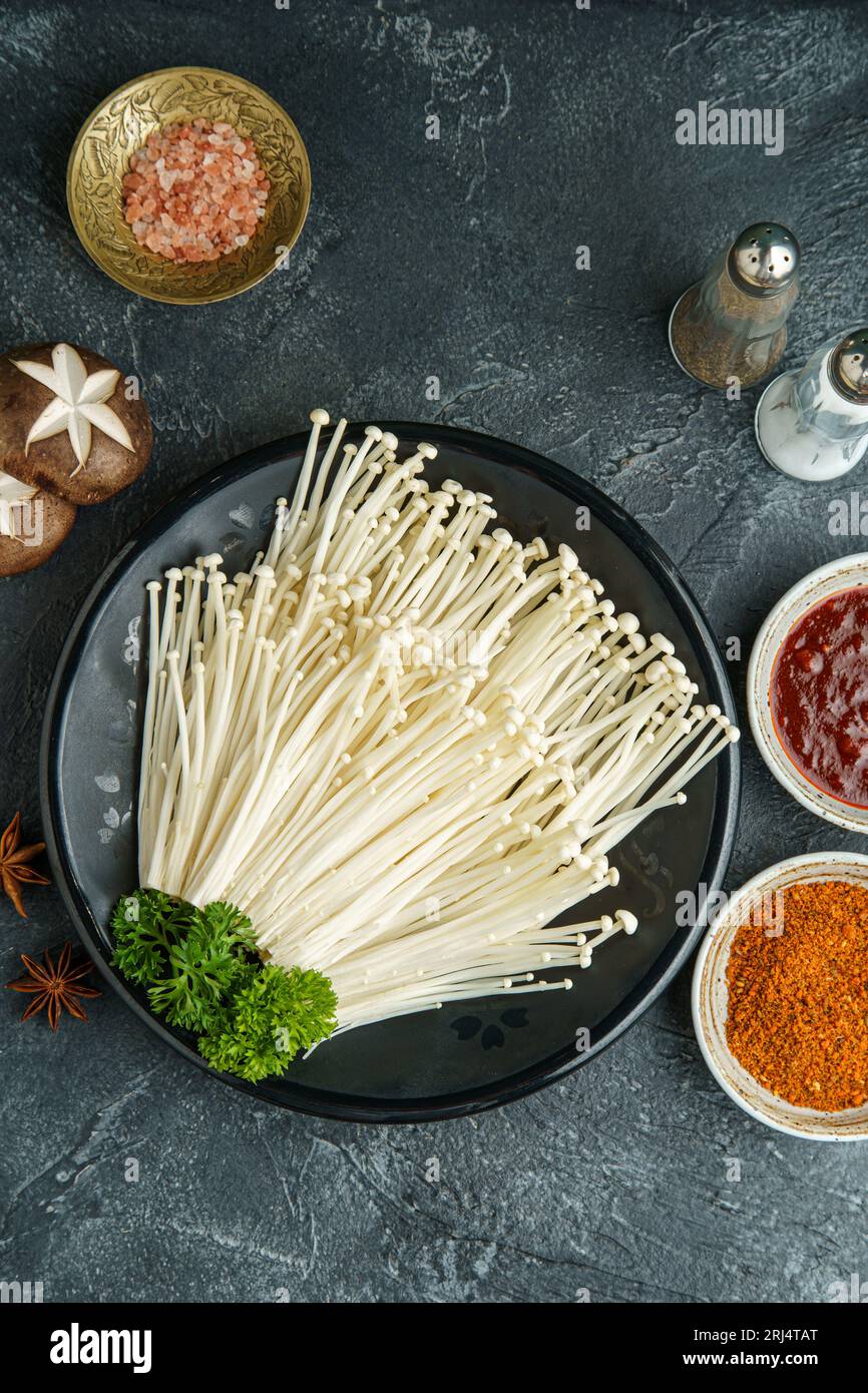 Baked Golden Needle Mushroom, top view Stock Photo - Alamy