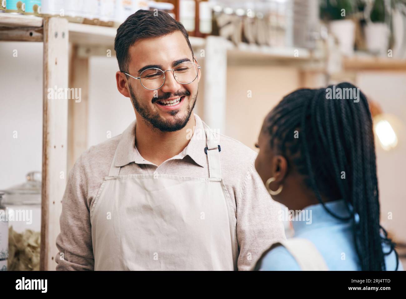 Sales man helping customer in store hi-res stock photography and images ...