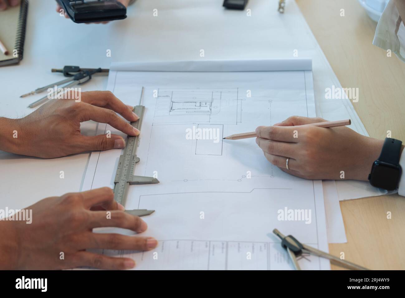 Group of engineer is discussion and brainstorming about condominium ...