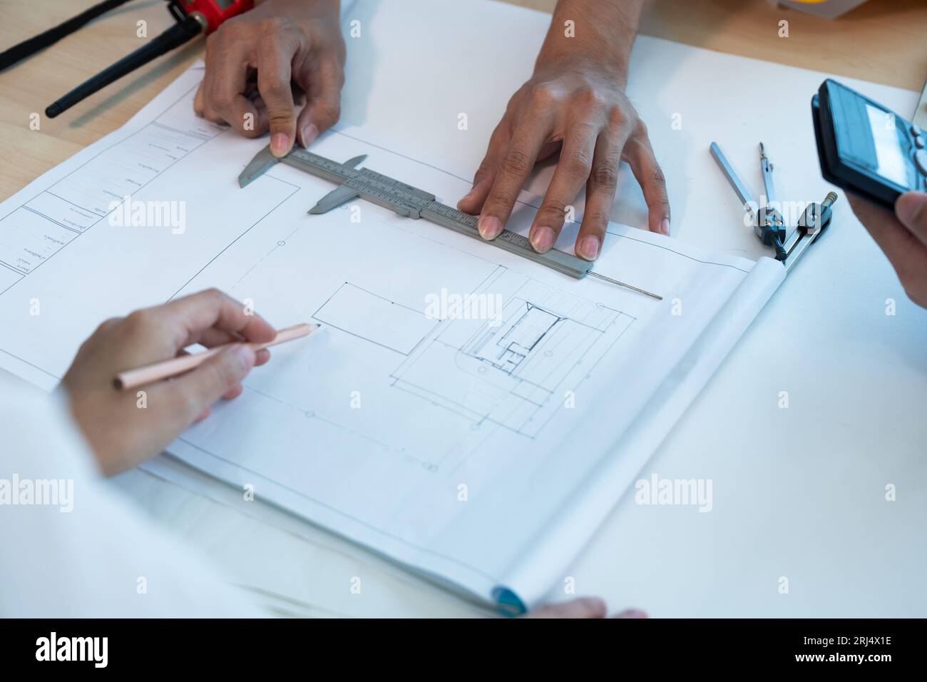 Group of engineer is discussion and brainstorming about condominium ...