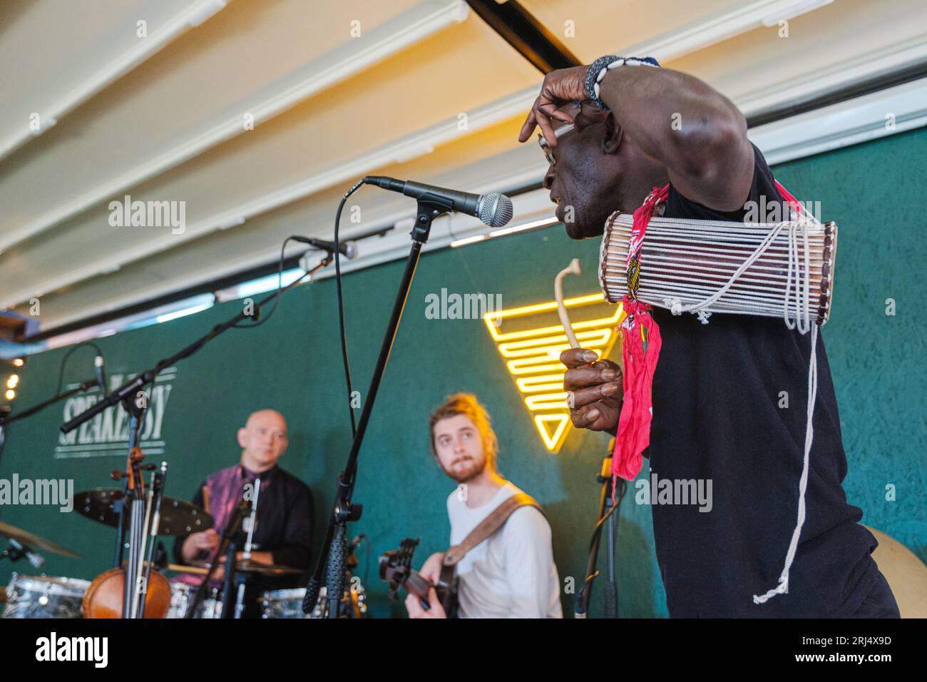 Live performance featuring saxophone hi-res stock photography and ...