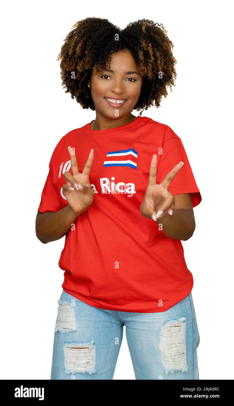 Happy female football fan from Costa Rica with red soccer jersey isolated on white background ...