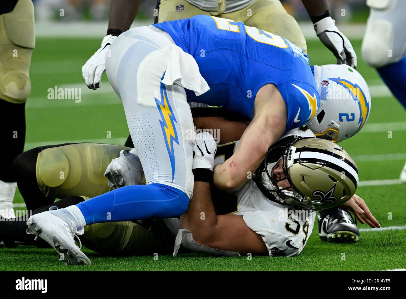 Los Angeles Chargers quarterback Easton Stick (2) holds onto the ball ...
